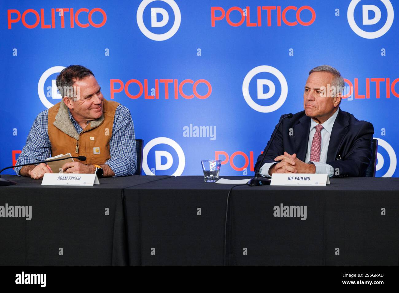 Adam Frisch, left, speaks at a forum with candidates to become the ...