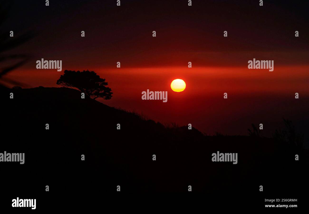 Swansea, UK. 17th Jan, 2025. The sun rises at Langland Bay on the Gower ...