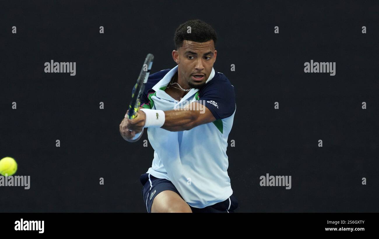 Arthur Fils of France plays a backhand return to compatriot Ugo Humbert ...