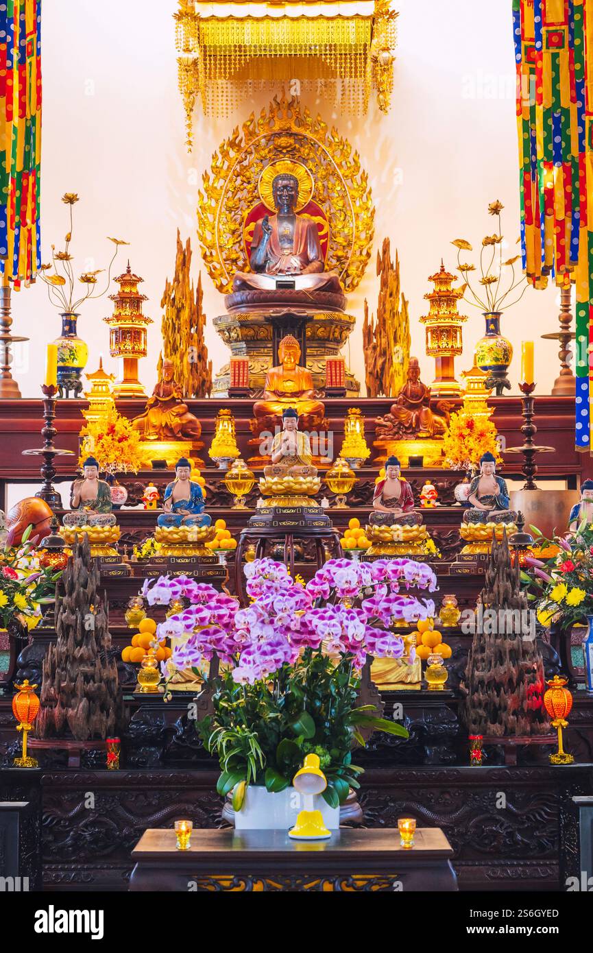 The interior and altar of a Buddhist temple in Asia, Vietnam, at the ...