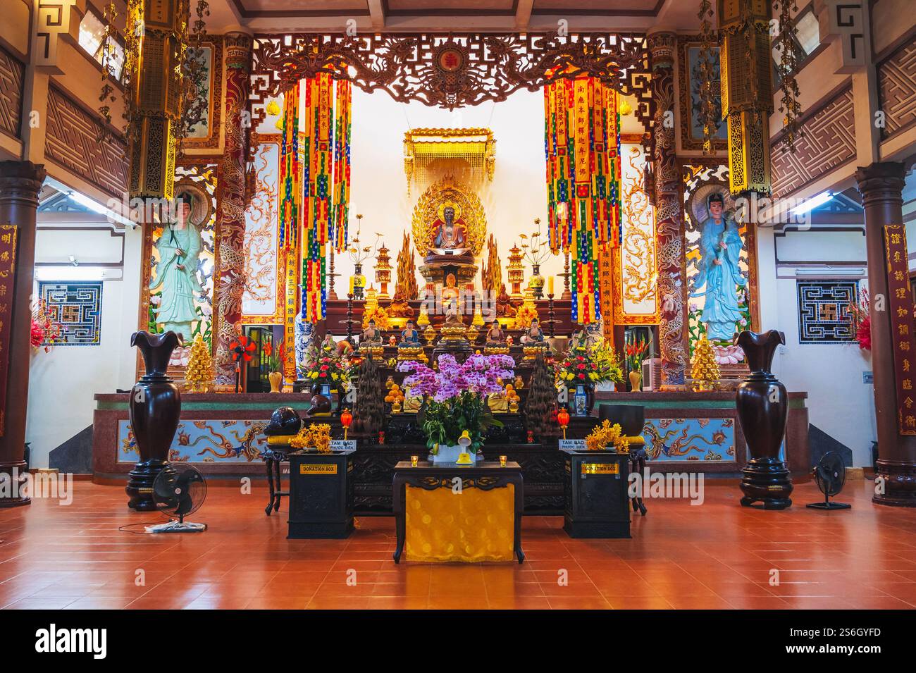 The interior and altar of a Buddhist temple in Asia, Vietnam, at the ...