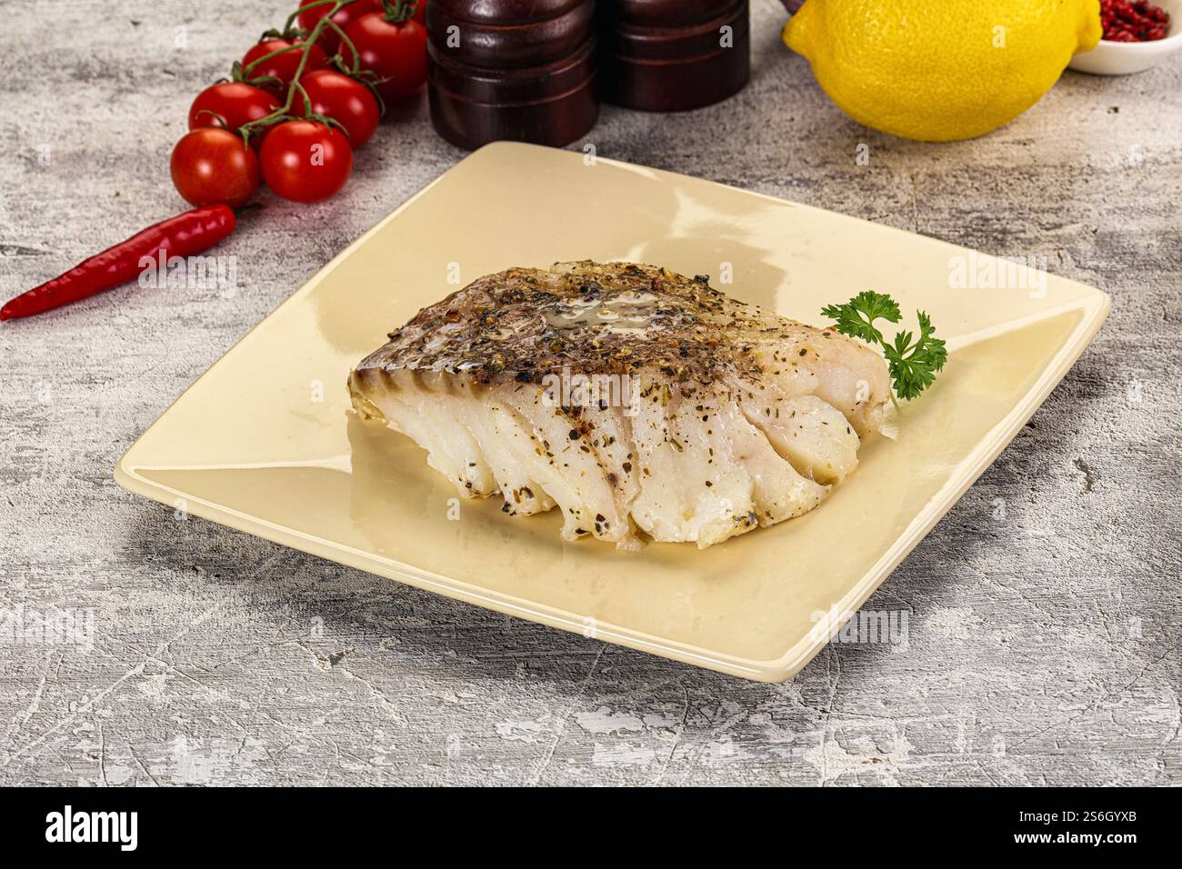 Dietary Baked cod fish fillet with spices Stock Photo - Alamy