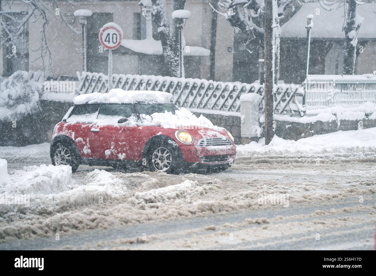 Car covered with snow during snow storm Stock Photo - Alamy