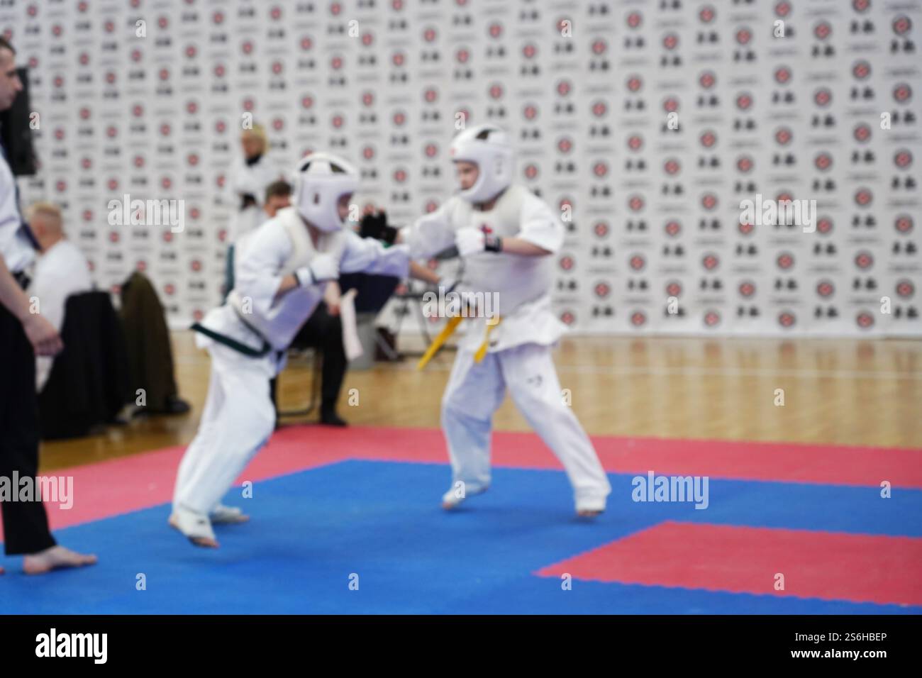 Blurred Defocused Image With Two Karate Practitioners Sparring On A