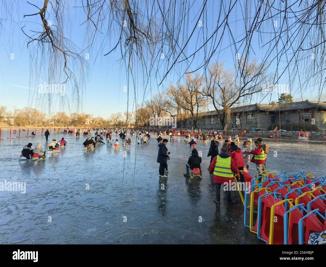 Visitors play at the ice rink in the Old Summer Palace in Beijing ...