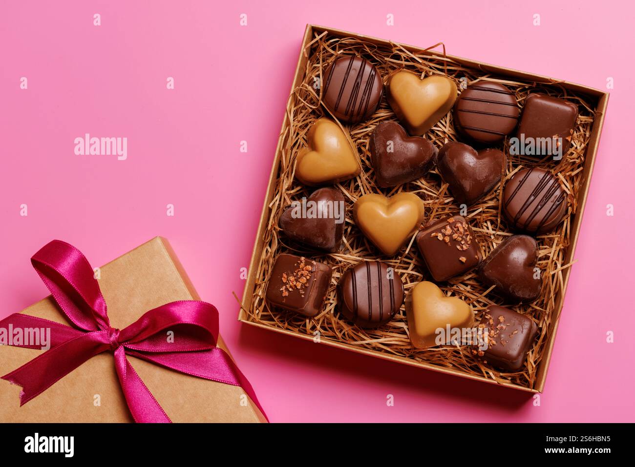 Valentines day box of rich chocolates, set against a romantic backdrop ...
