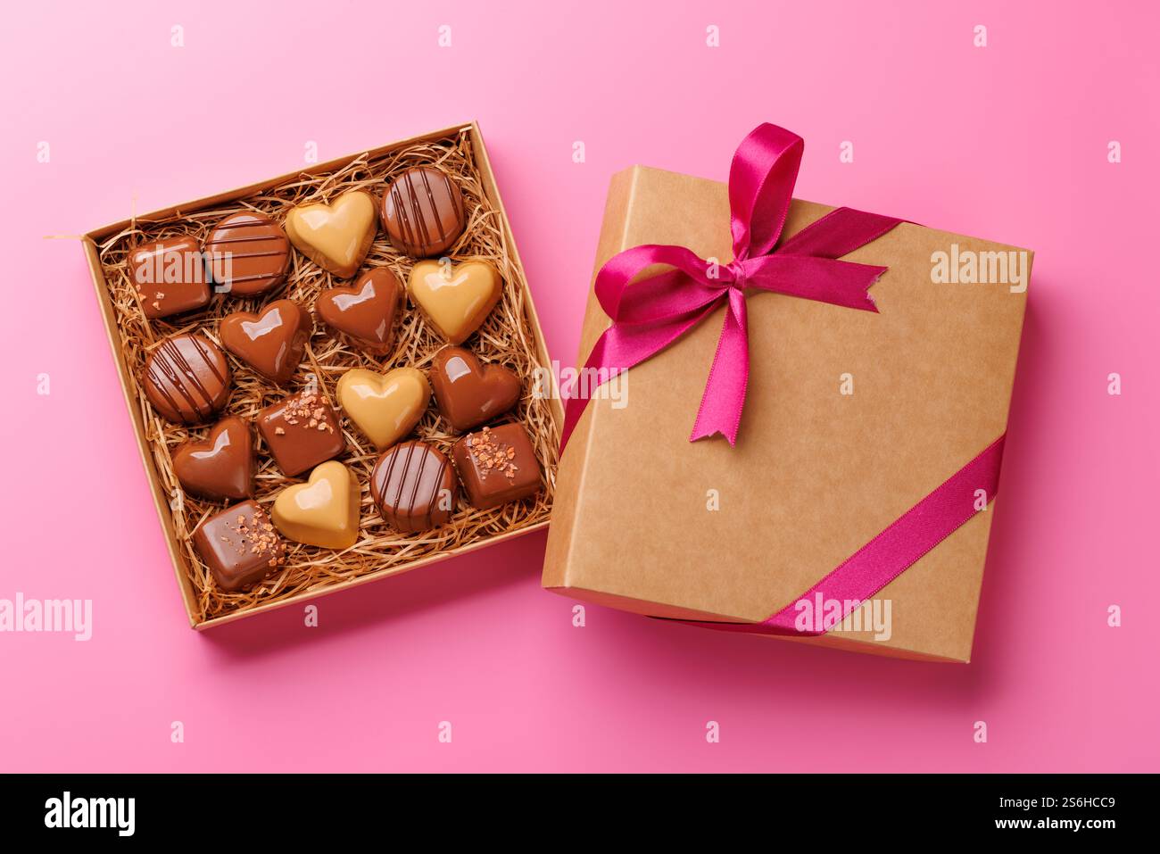 Valentines day box of rich chocolates, set against a romantic backdrop ...