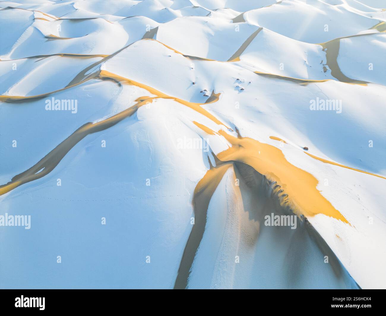 Aerial photo shows the snow scenery of Taklamakan Desert in Yuli County ...