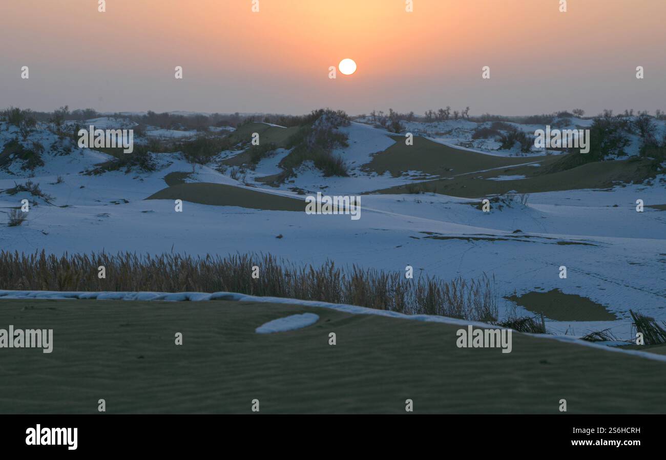 Aerial photo shows the snow scenery of Taklamakan Desert in Yuli County ...