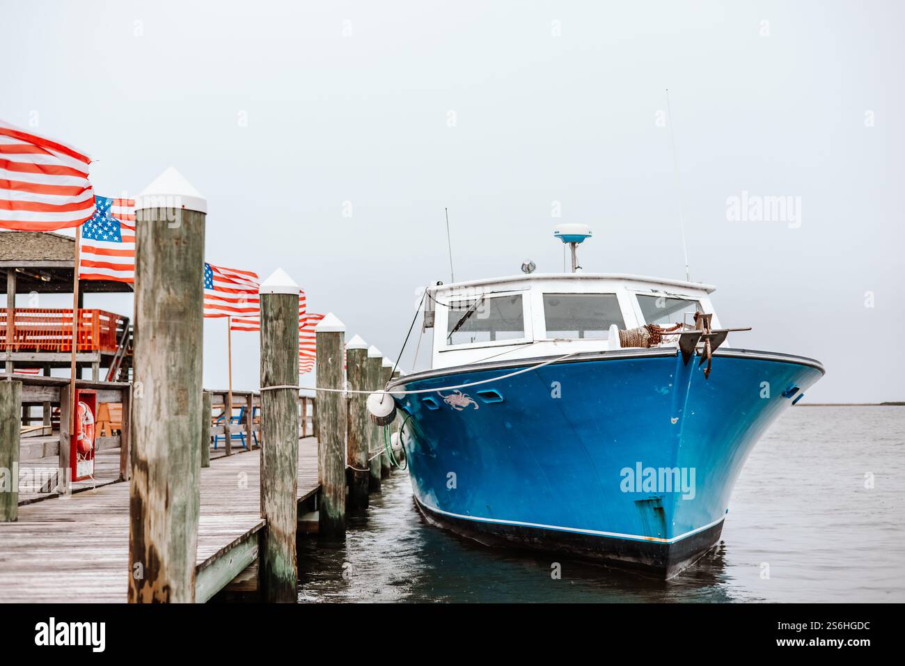 Blue Boat in Water at Crisfield, Maryland Stock Photo - Alamy