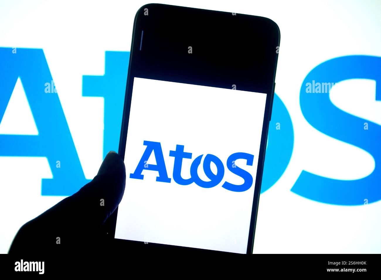 In this photo illustration, an ATOS logo is seen displayed on a ...
