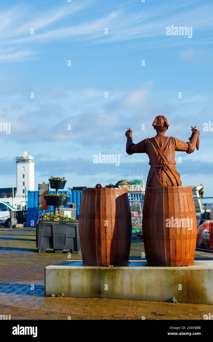 Corten steel statue of the Herring Girl sculpture by Ray Lonsdale Bell ...