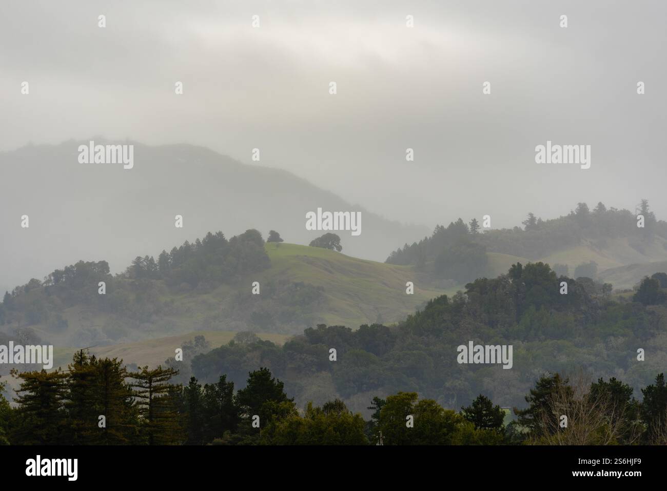Misty Farm in the Valley Stock Photo - Alamy