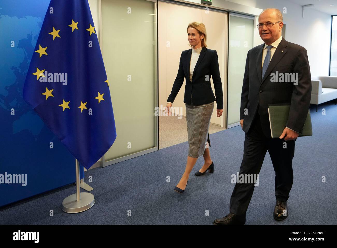 European Union foreign policy chief Kaja Kallas, left, walks with ...