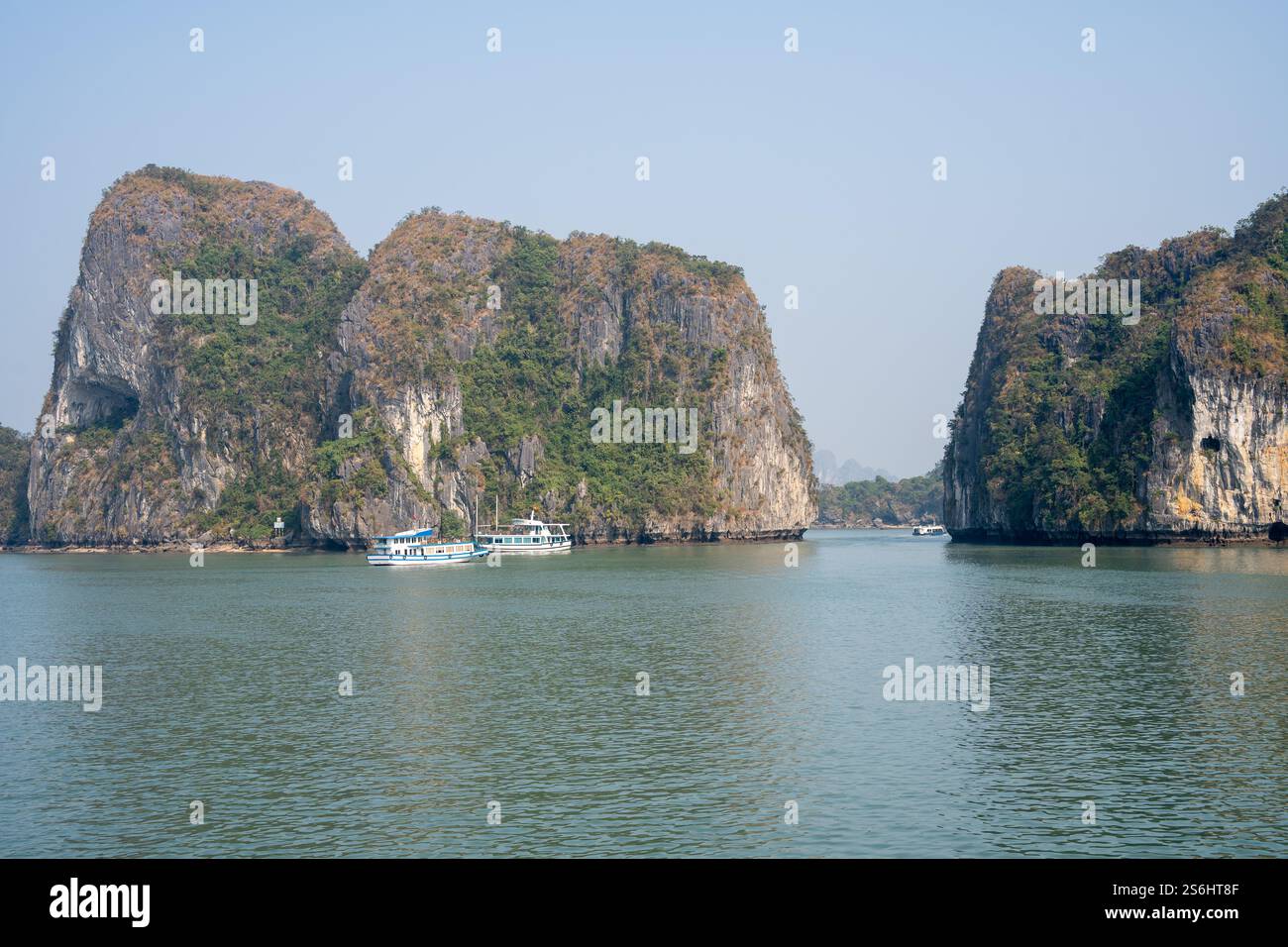 Halong Bay with limestone cliffs and boats in the Gulf of Tonkin north ...
