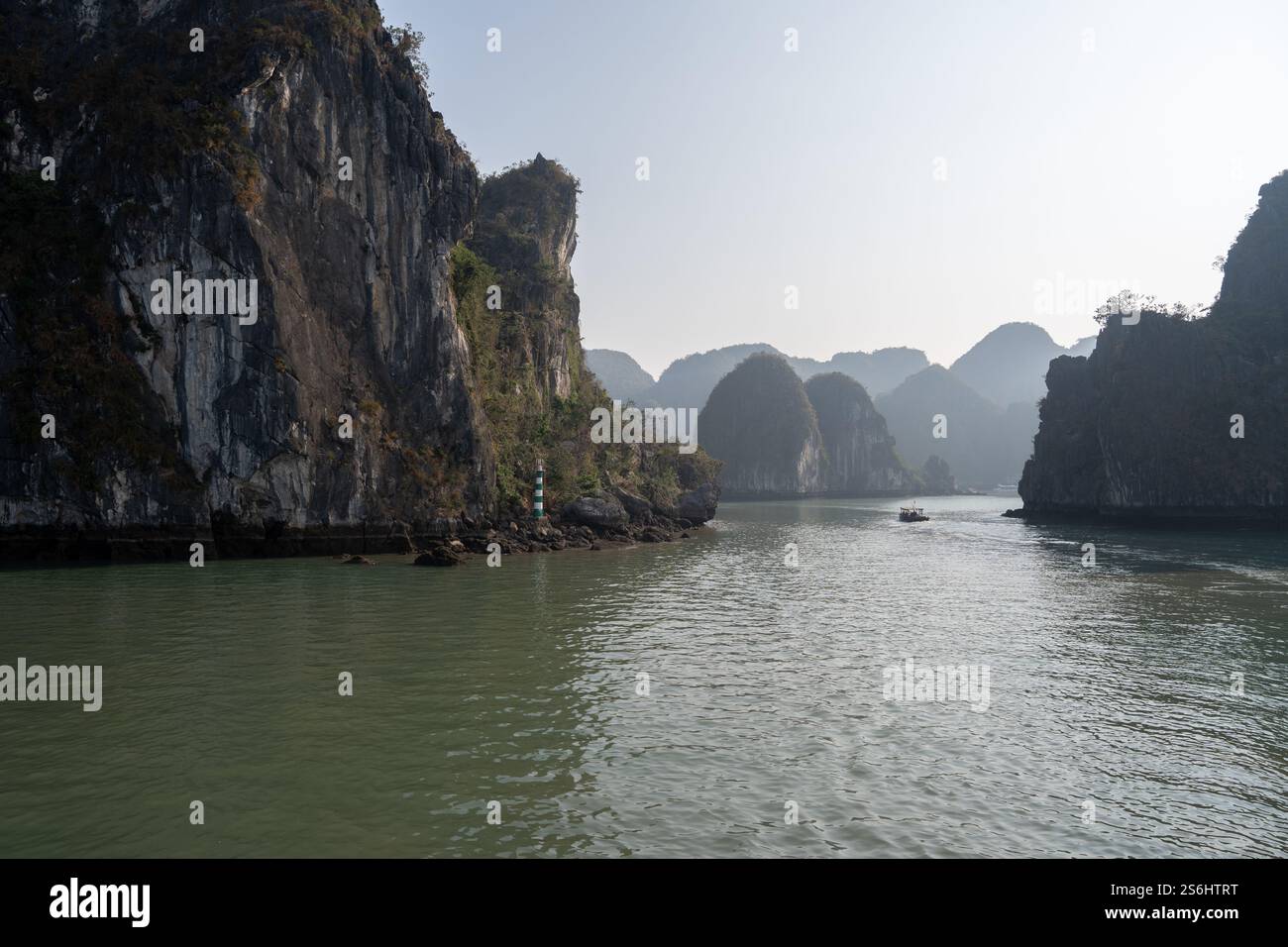 Halong Bay with limestone cliffs and boats in the Gulf of Tonkin north ...