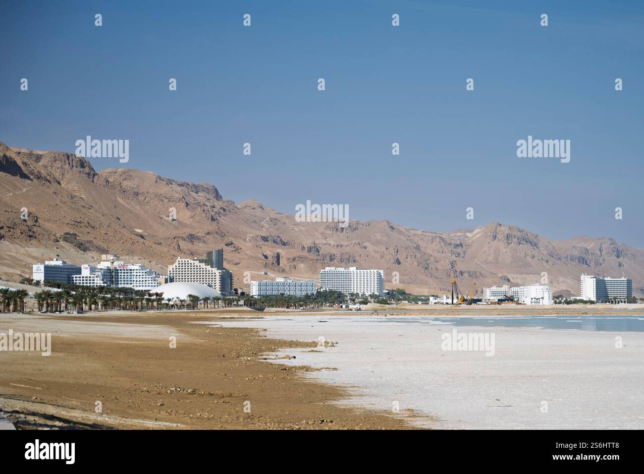 Salt flats Hotels in the background - the salt deposits are caused by ...