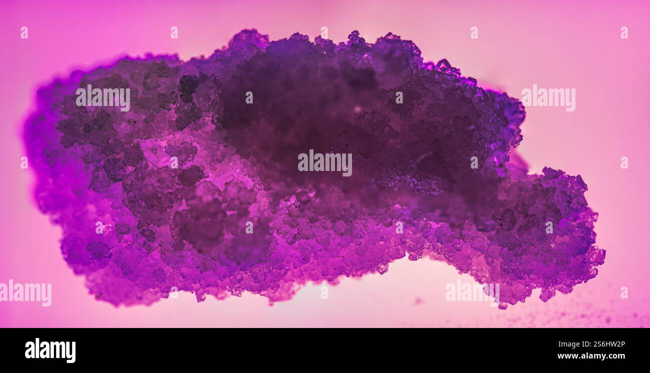 Backlit lump of Dead Sea salt with red light Stock Photo - Alamy