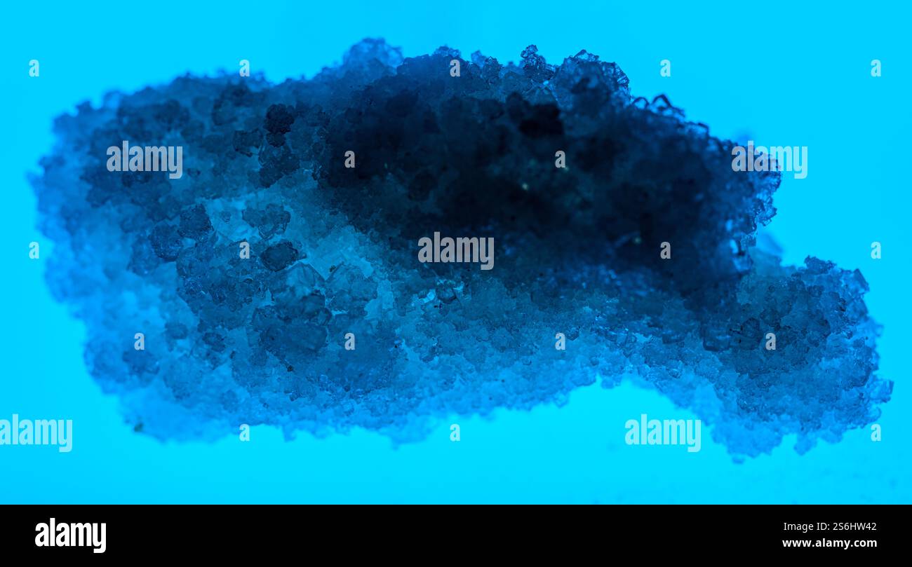 Backlit lump of Dead Sea salt with blue light Stock Photo - Alamy