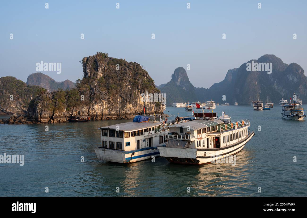 Halong Bay with limestone cliffs and boats in the Gulf of Tonkin north ...