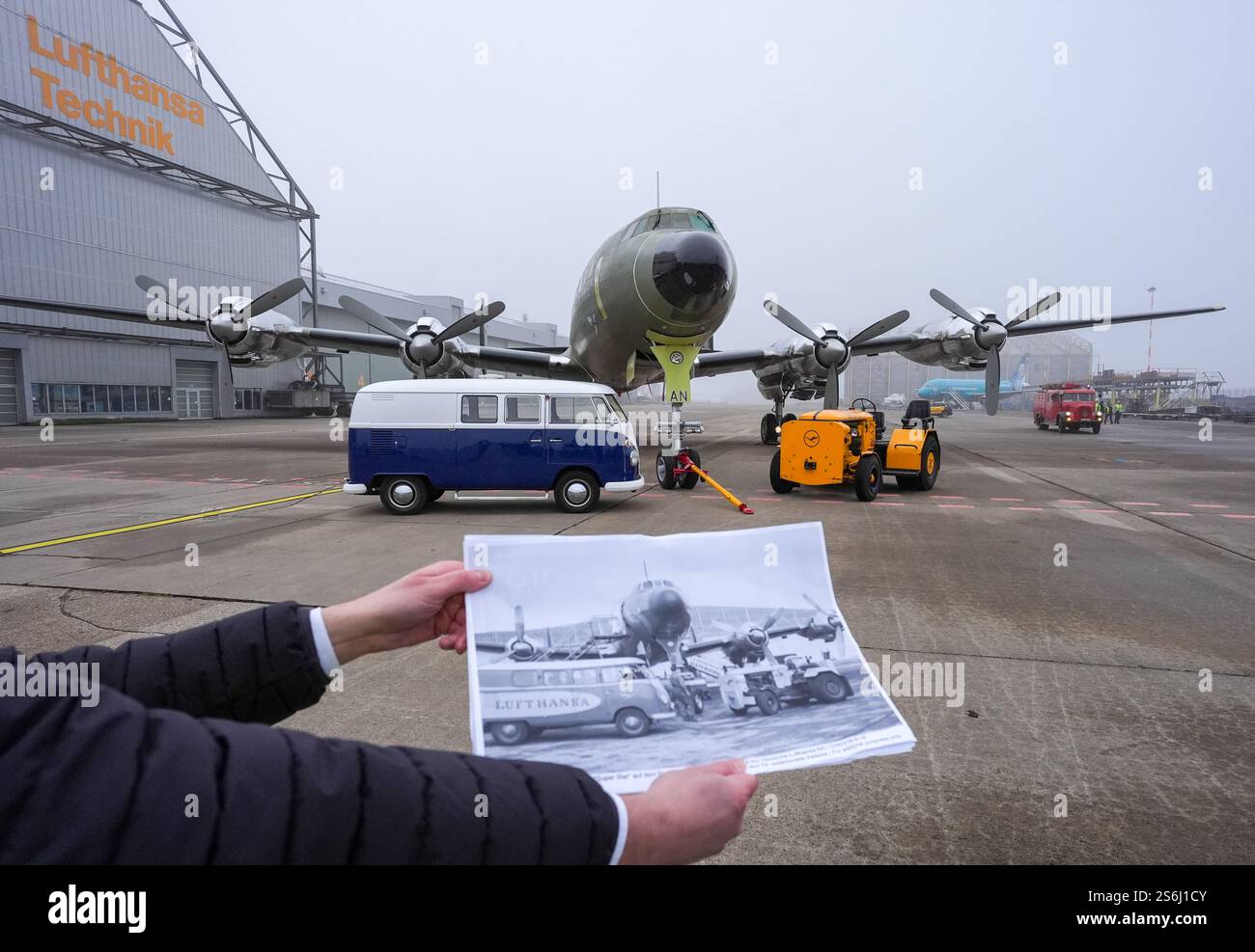 Hamburg, Germany. 17th Jan, 2025. After the roll-out, an employee holds ...