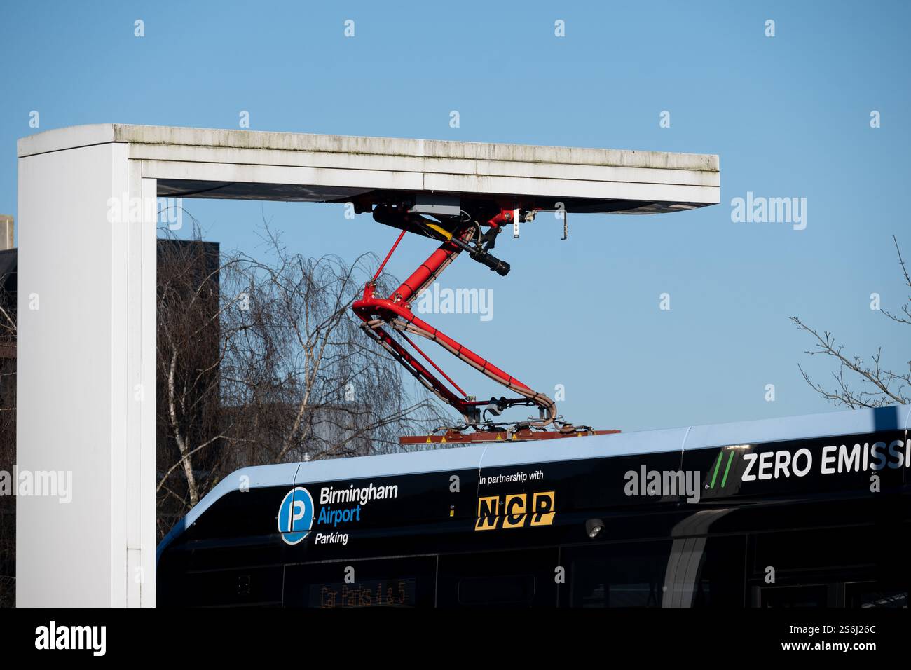 Overhead electric bus charging at Birmingham Airport, UK Stock Photo ...