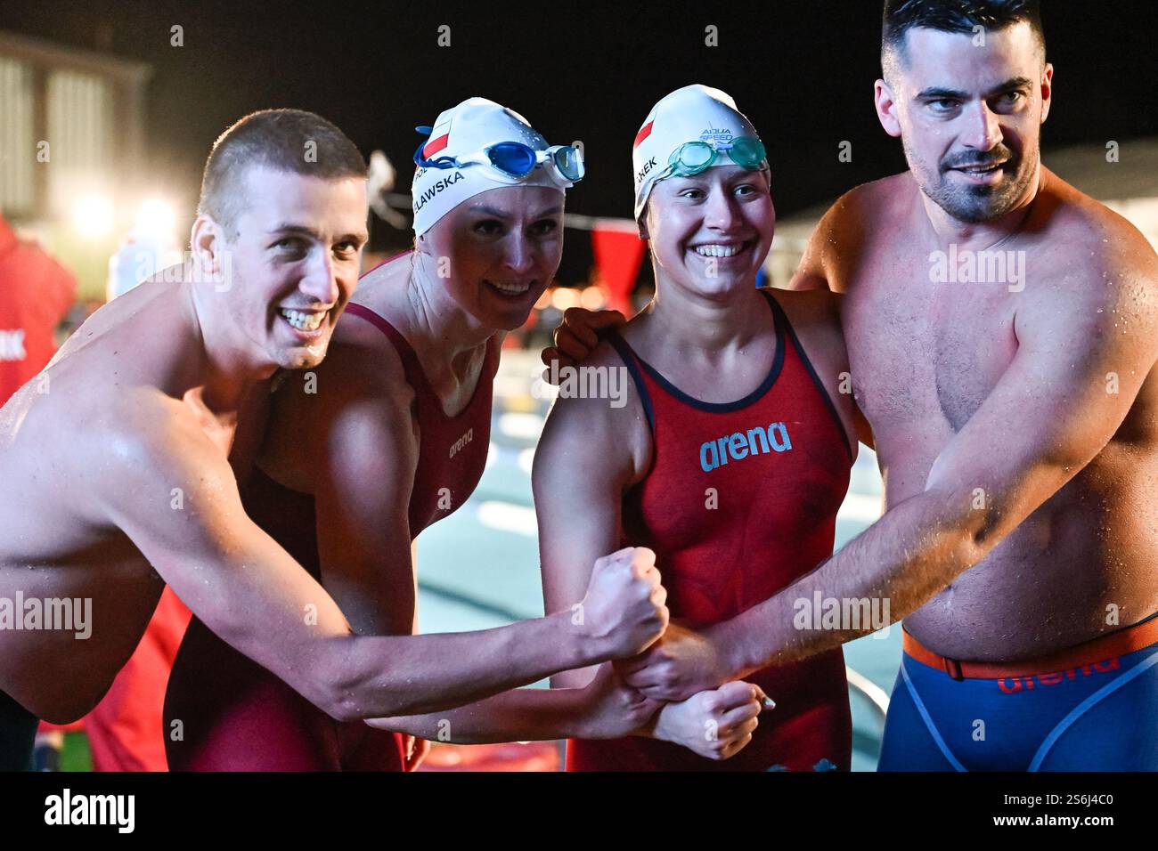 Athletes of team Poland react after competing in the 4x50m Medley Mixed ...