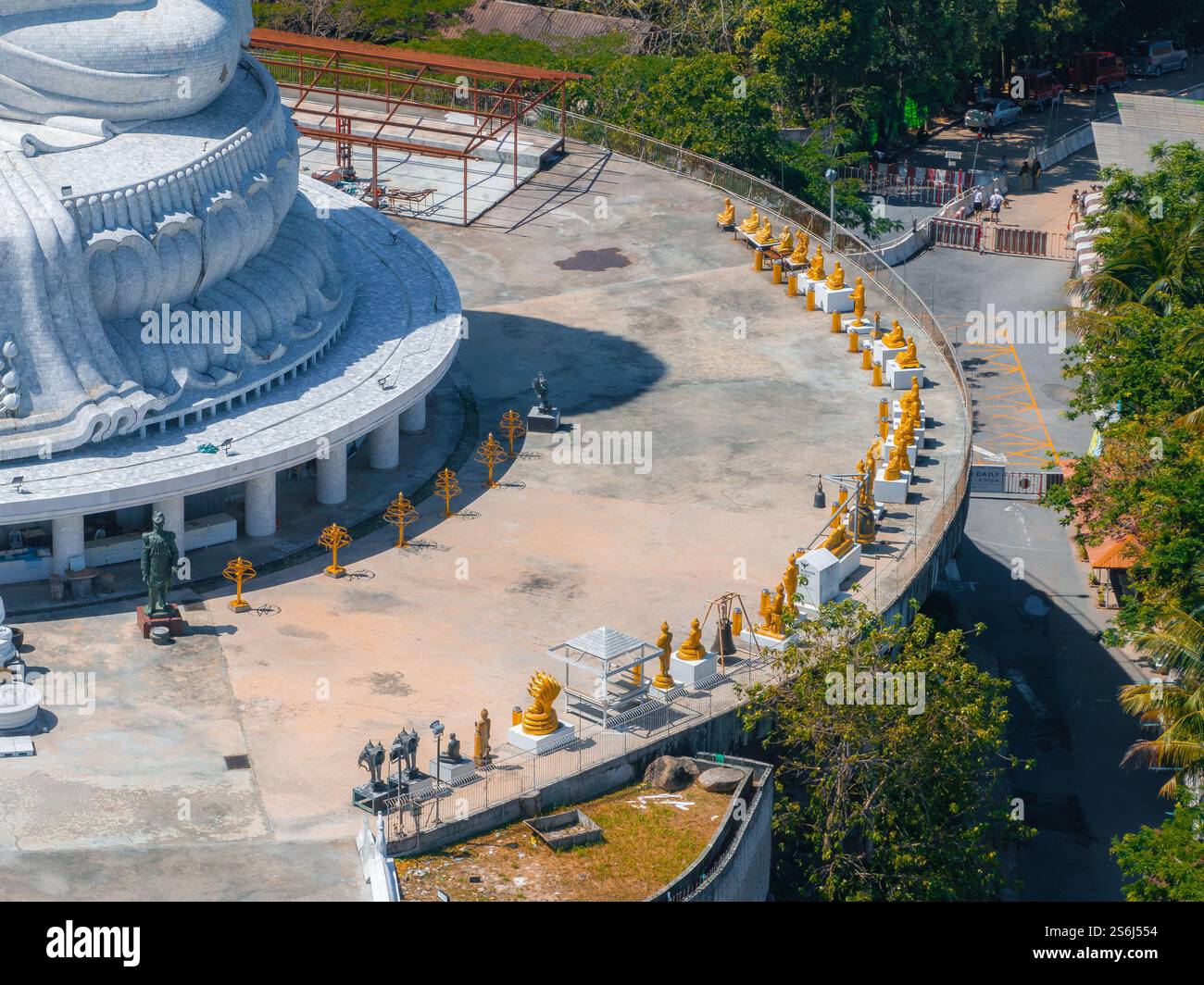 Aerial view of the Big Buddha statue in Phuket, Thailand, with golden ...