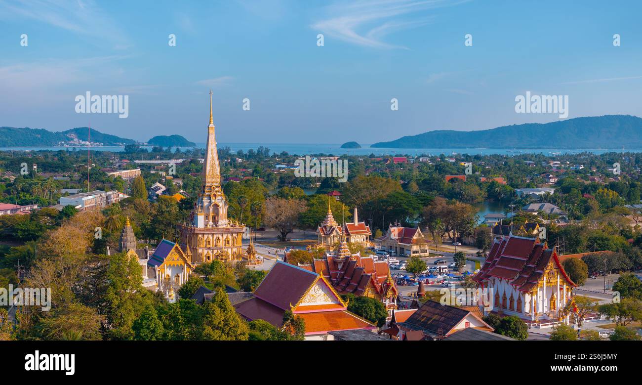 Aerial view of Wat Chalong in Phuket, Thailand, featuring the golden ...