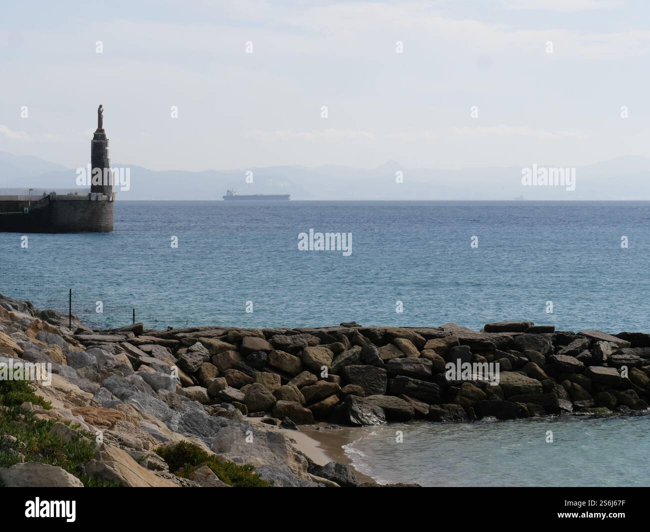 A huge Jesus statue greets the ships in Tarifa Spain Stock Photo - Alamy