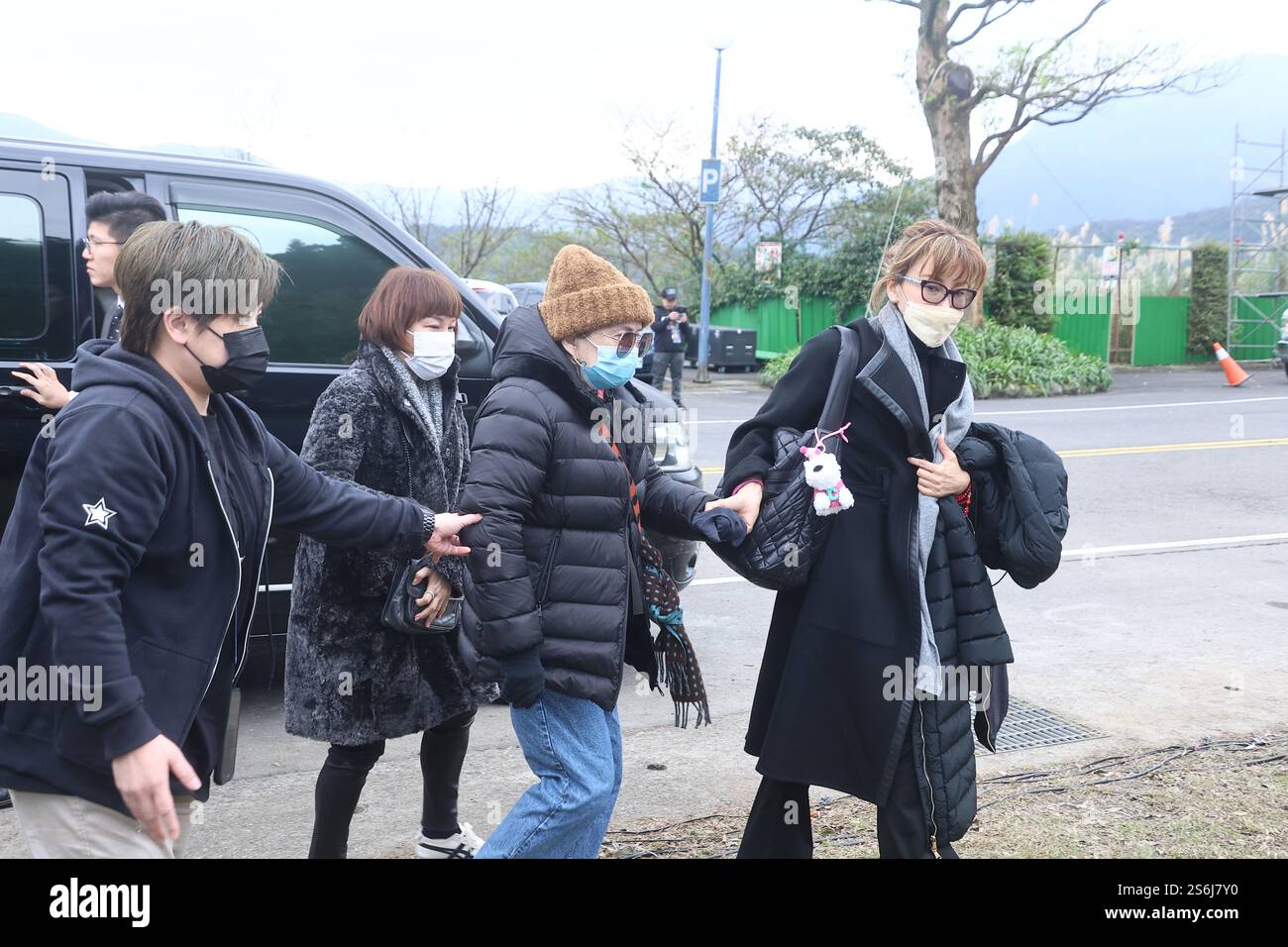 TAIPEI, CHINA - JANUARY 17, 2025 - Family members of female singer CoCo ...