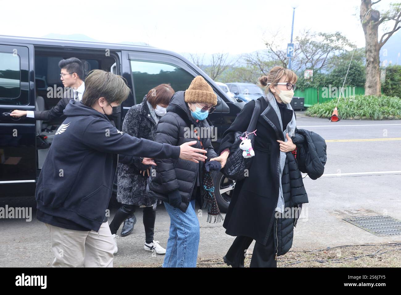 TAIPEI, CHINA - JANUARY 17, 2025 - Family members of female singer CoCo ...