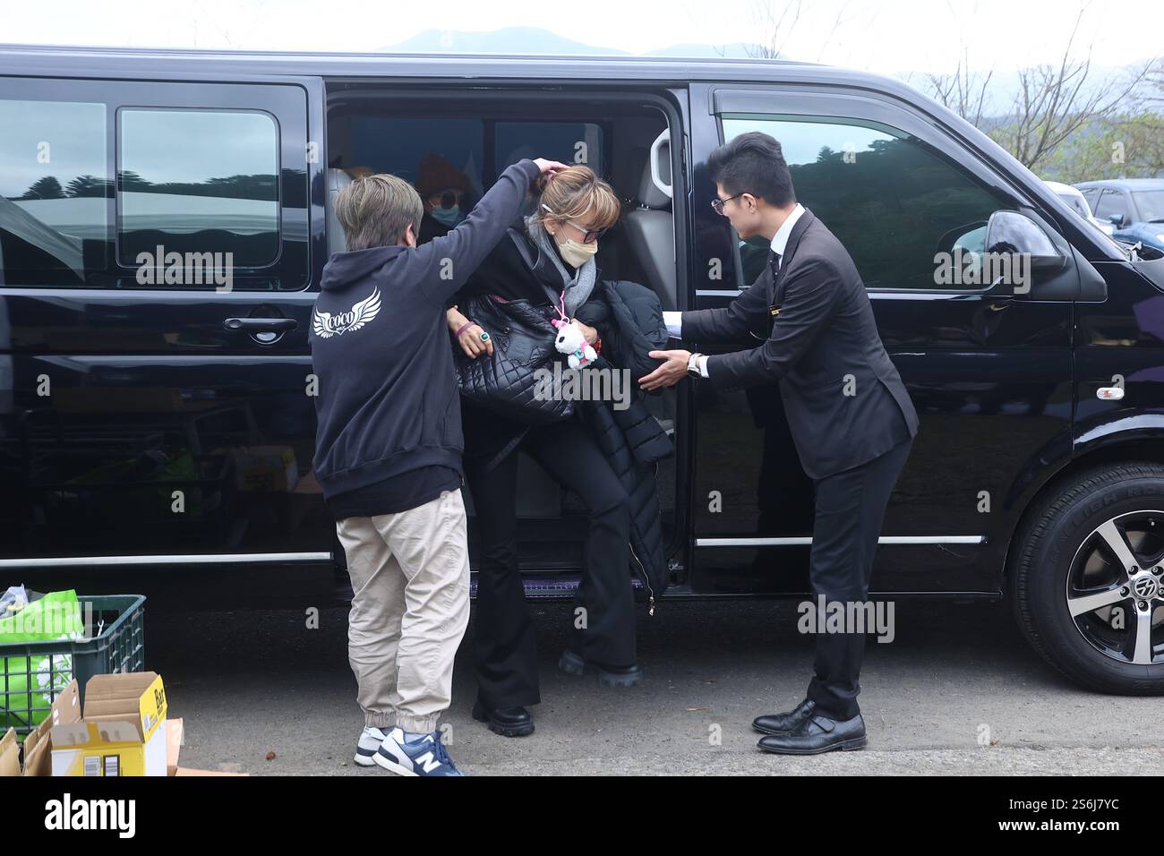 TAIPEI, CHINA - JANUARY 17, 2025 - Family members of female singer CoCo ...
