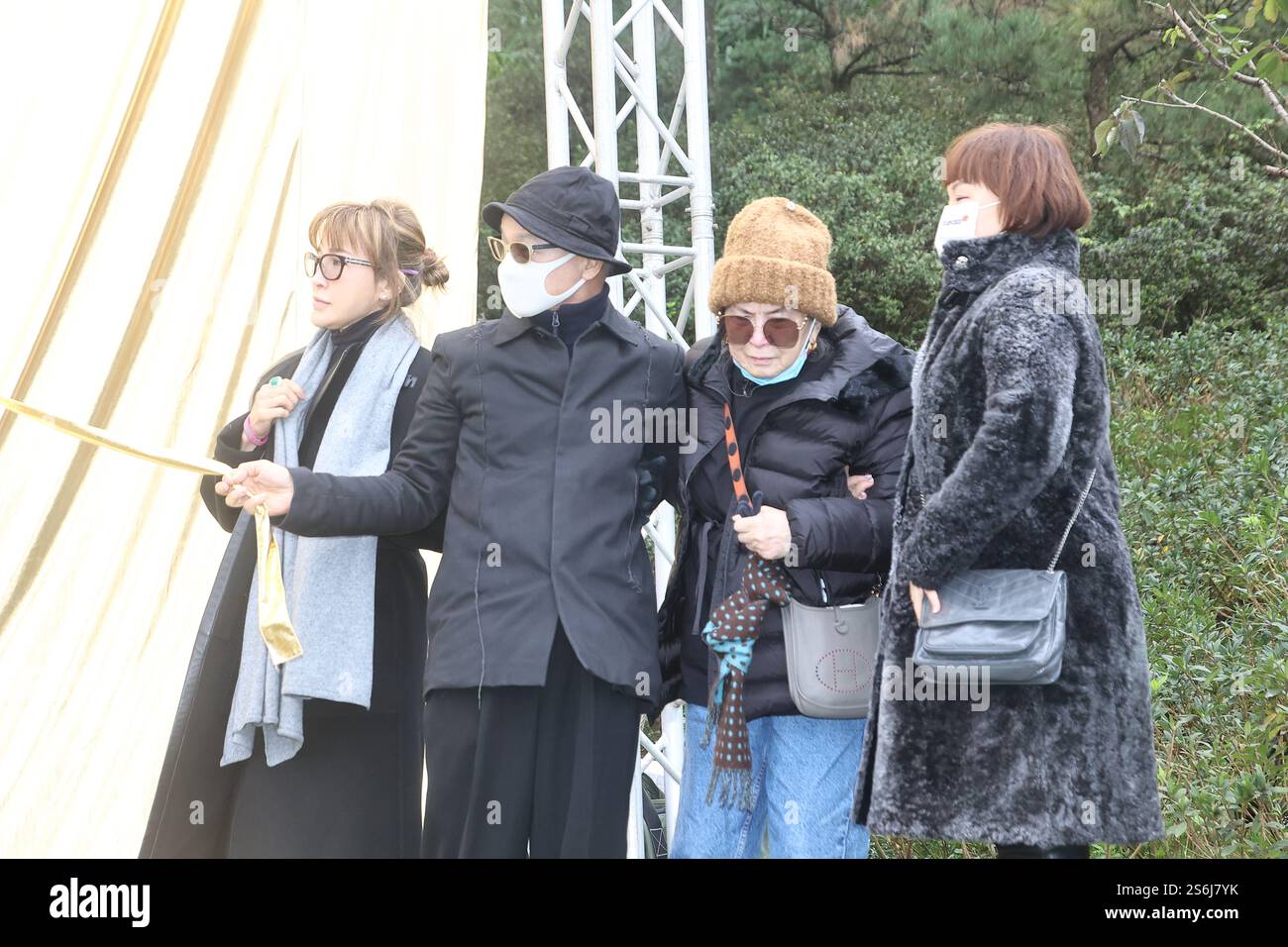 TAIPEI, CHINA - JANUARY 17, 2025 - Family members of female singer CoCo ...