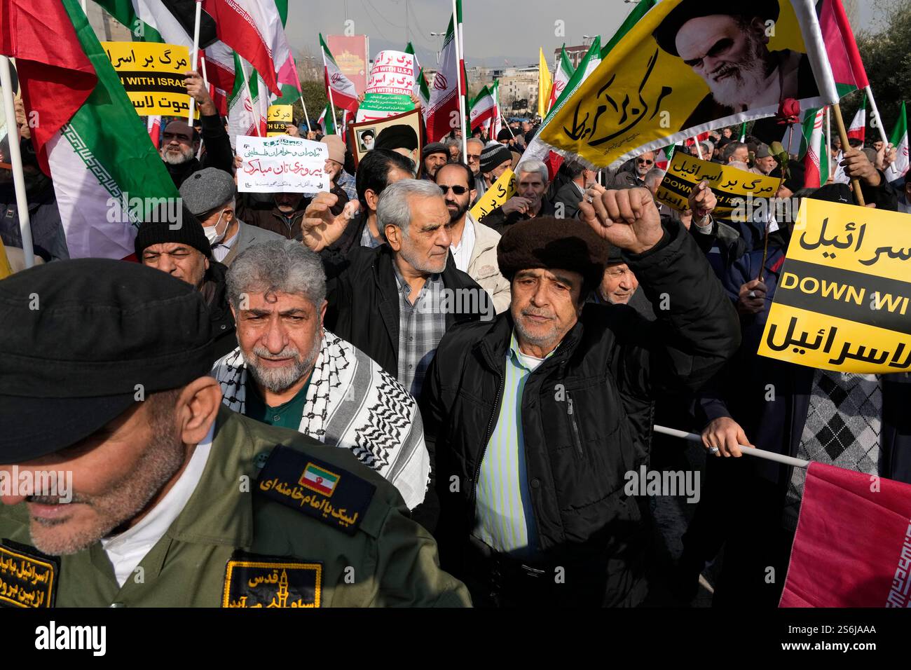 Iranian worshippers chant slogans as they attend a rally to celebrate ...