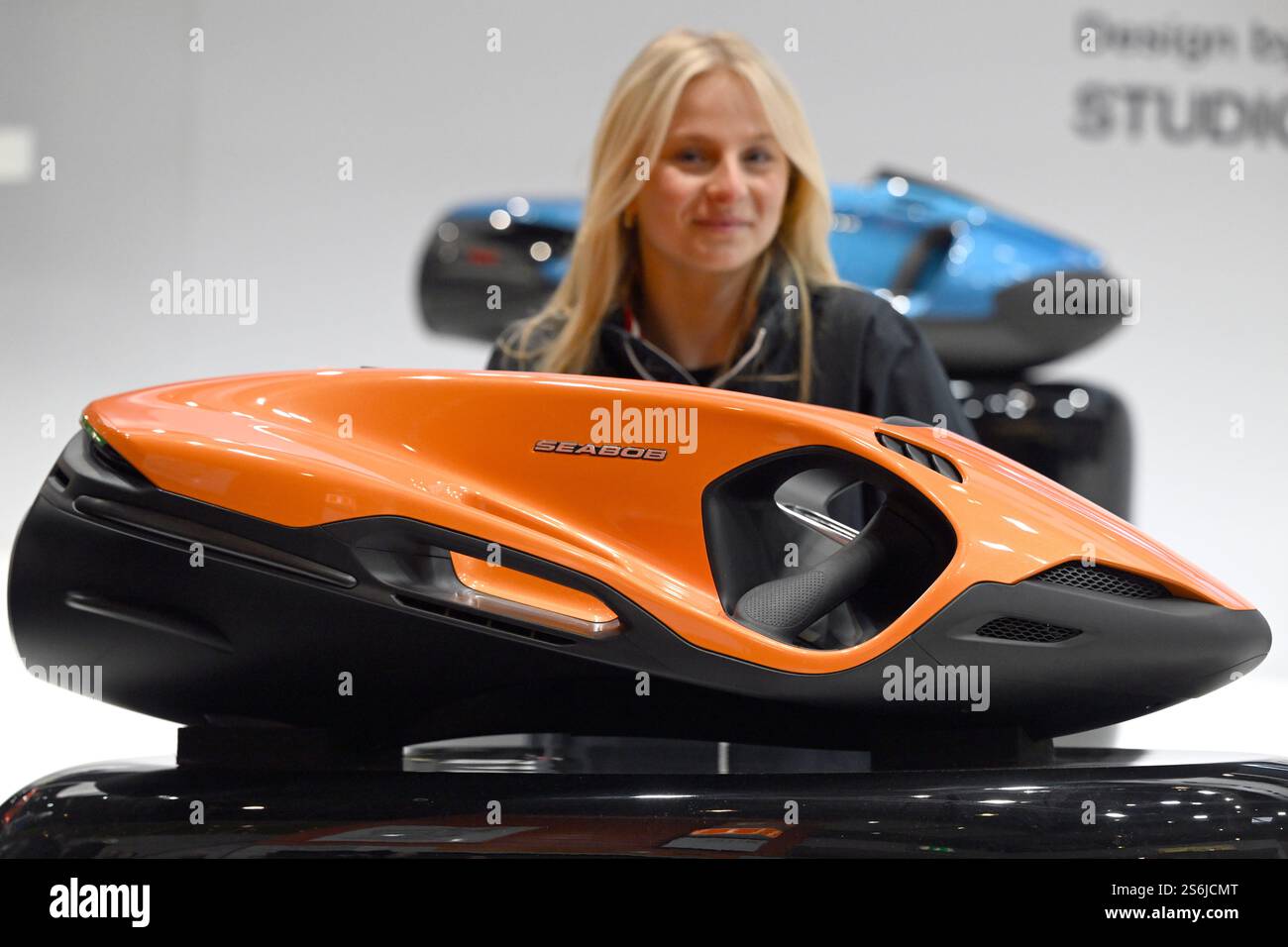 Duesseldorf, Germany. 17th Jan, 2025. A model poses with a Seabob F9 ...