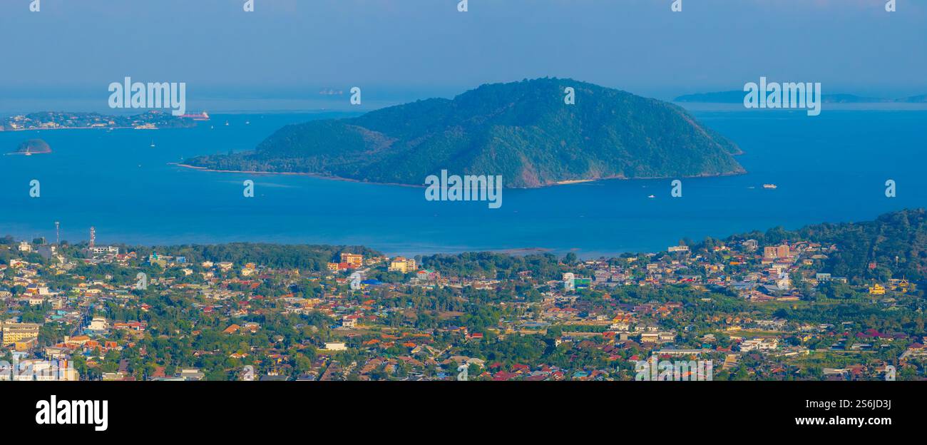 Aerial view of a coastal urban area in Phuket, Thailand, with scattered ...