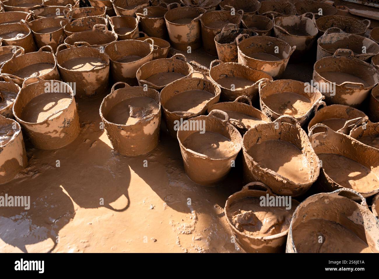 Street covered in mud and buckets full of mud after DANA water stream ...