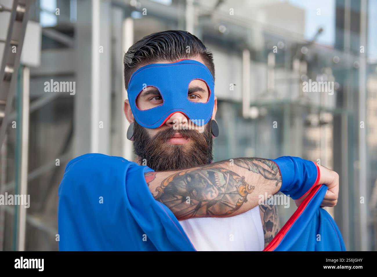 young hipster superhero is protecting the ccenter of town Stock Photo ...