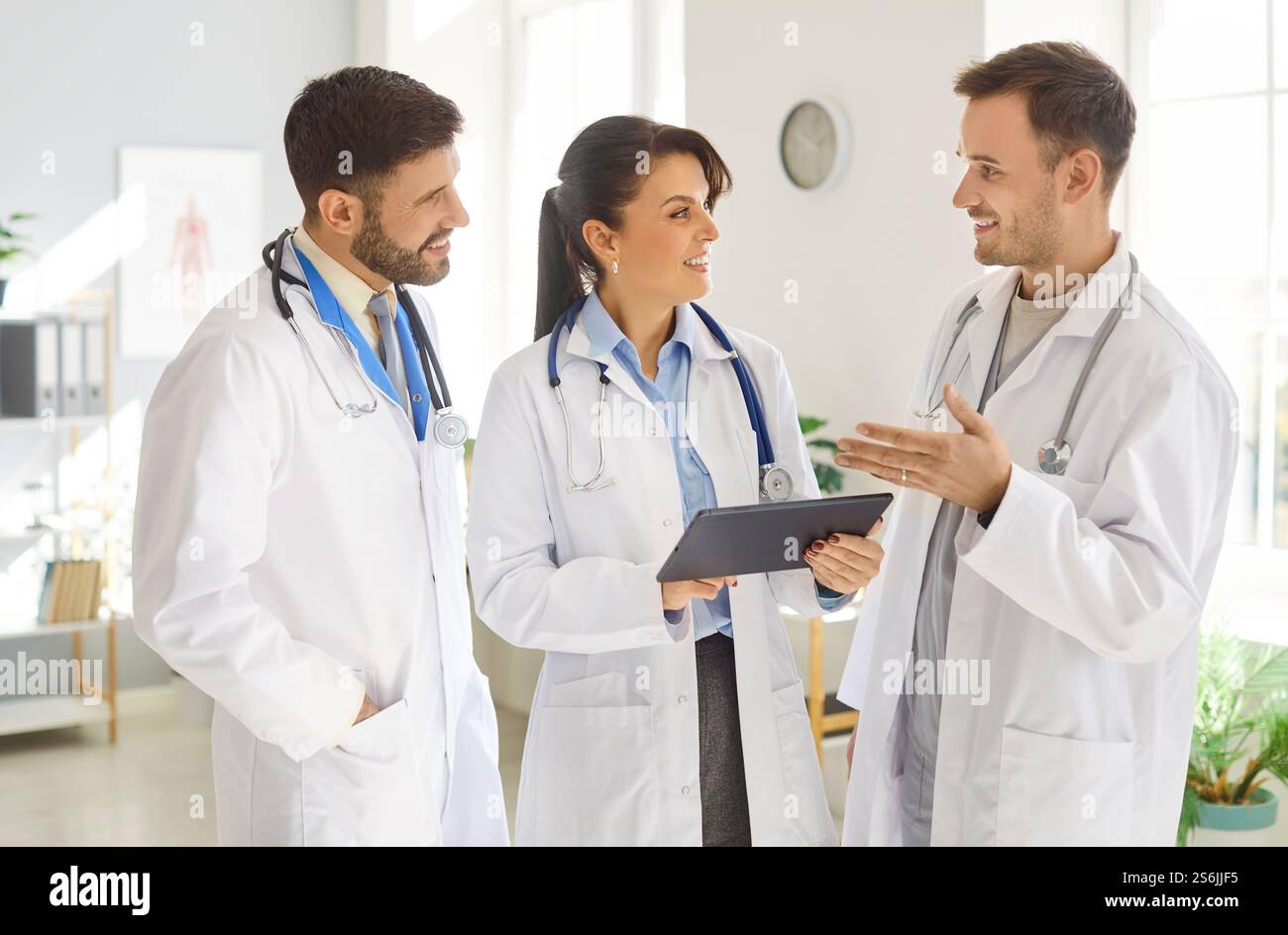 Doctors And Nurses Using Tablet Pc During Meeting Stock Photo - Alamy
