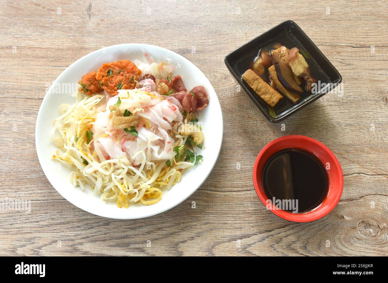 steamed large rice noodles topping slice fried Chinese sausage and ...