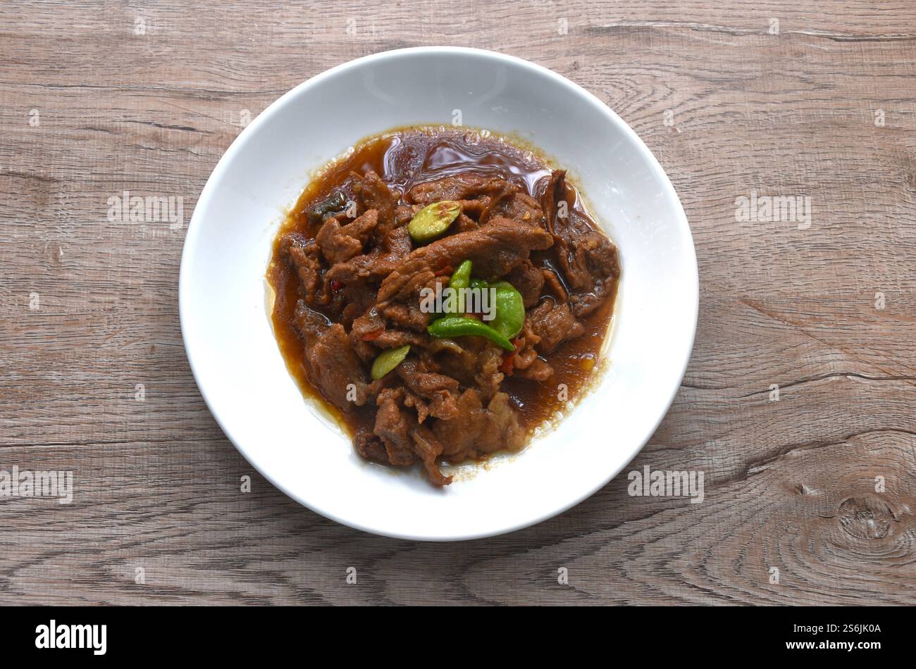 spicy stir fried slice pork with stink bean and chili in shrimp paste ...