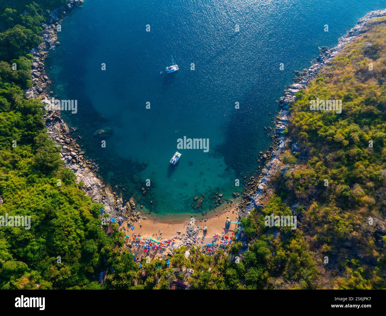 Aerial View of a Cove with Turquoise Waters and Sandy Beach in Thailand ...