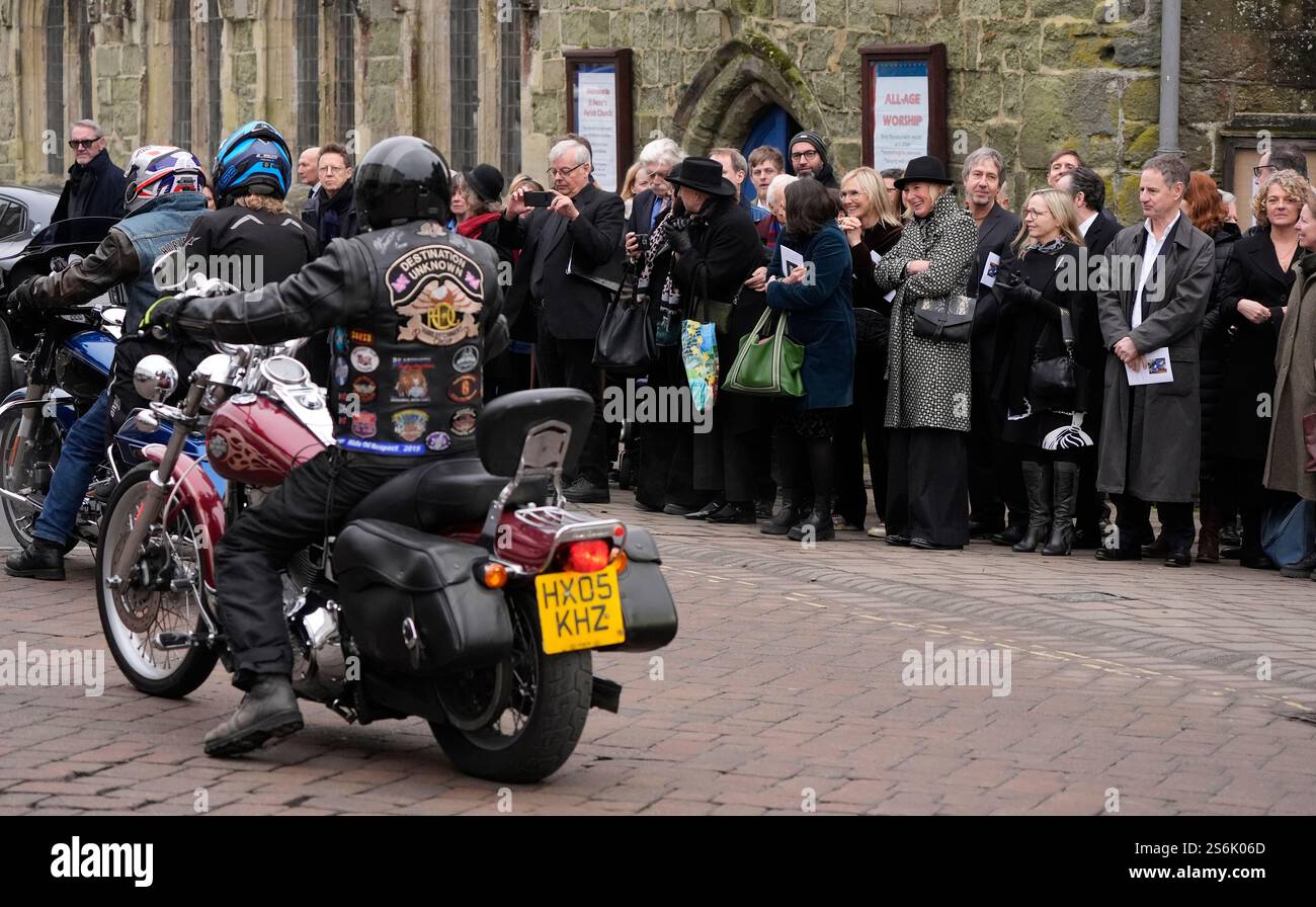 Harley Davidson riders ride behind the hearse in tribute following the ...