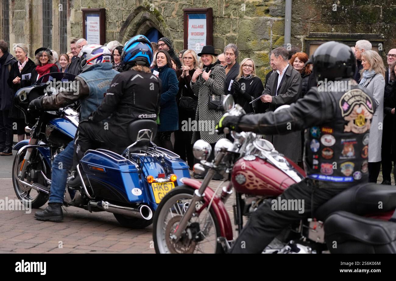 Harley Davidson riders ride behind the hearse in tribute following the ...