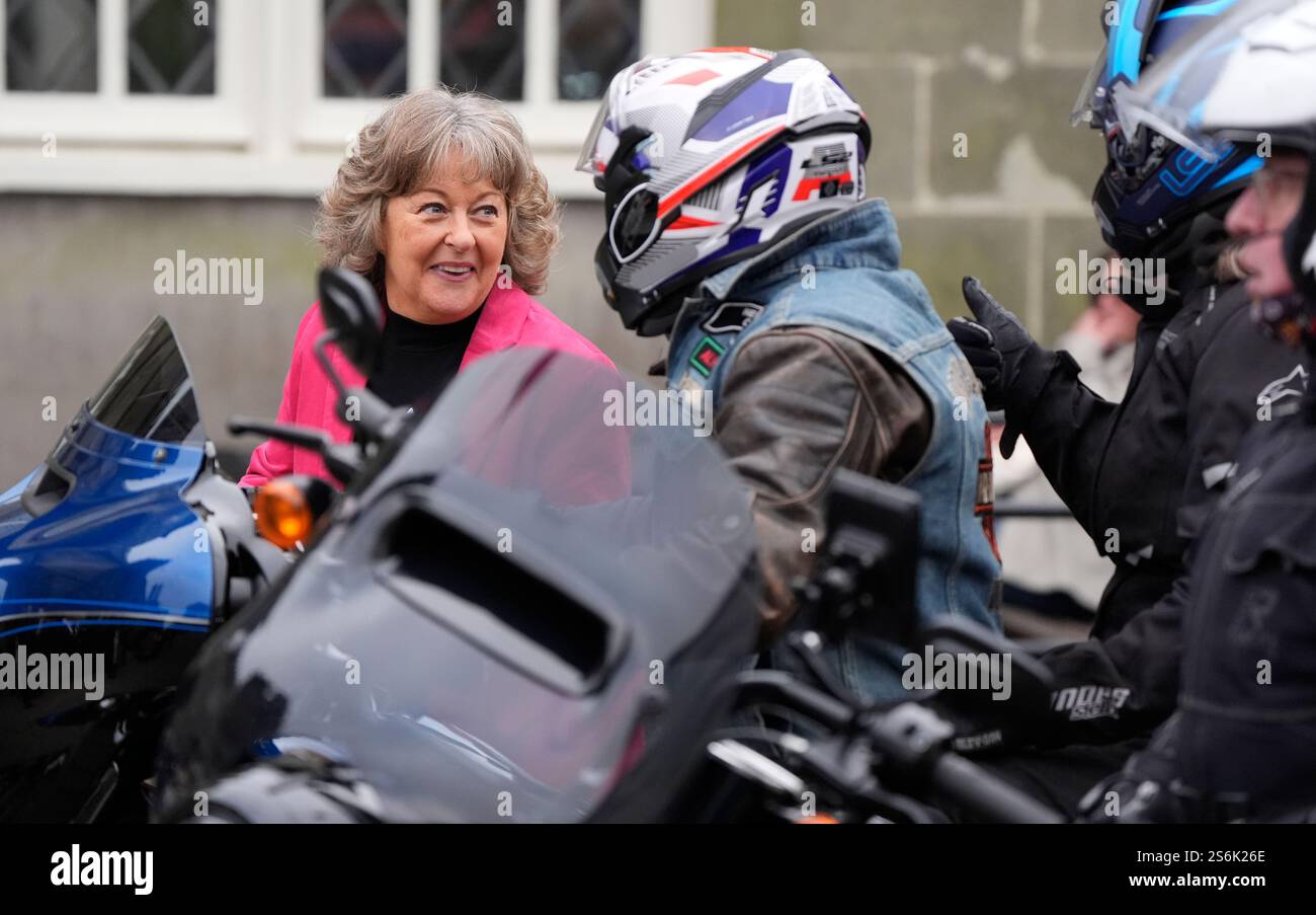 Tiggy Walker (left) chats with Harley Davidson riders who are escorting ...