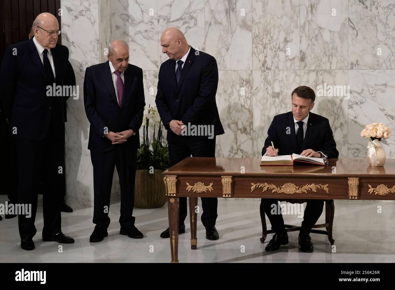 Lebanese President Joseph Aoun, second right, speaks with Parliament ...