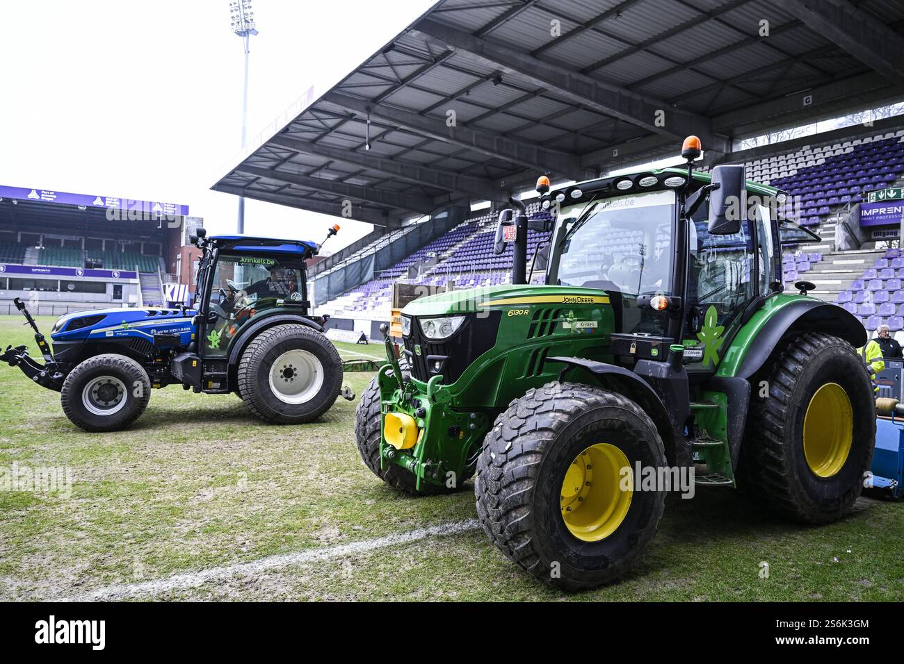 Tractors pictured during works to improve the pitch of Belgian soccer ...