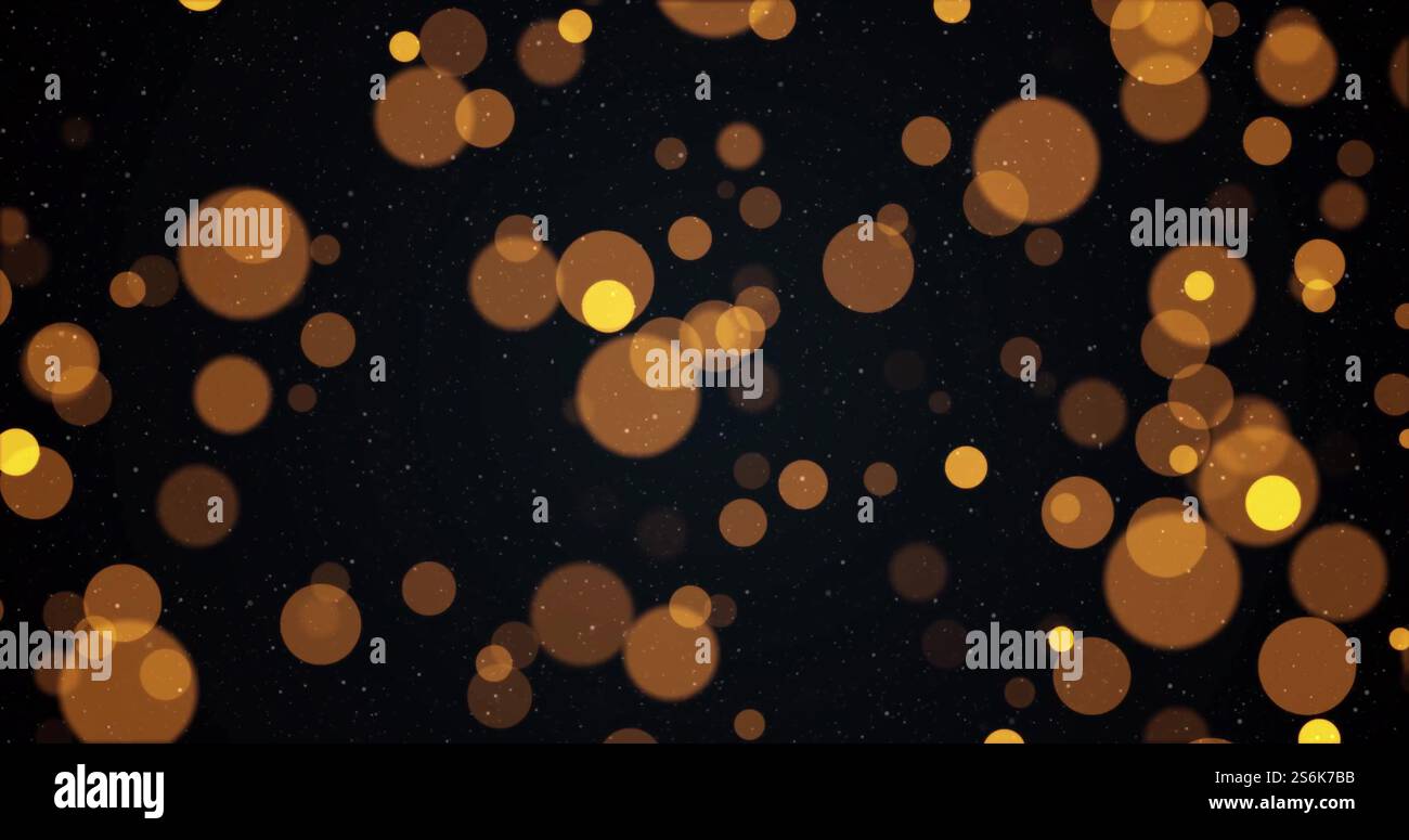 Image of yellow spots on black background Stock Photo - Alamy