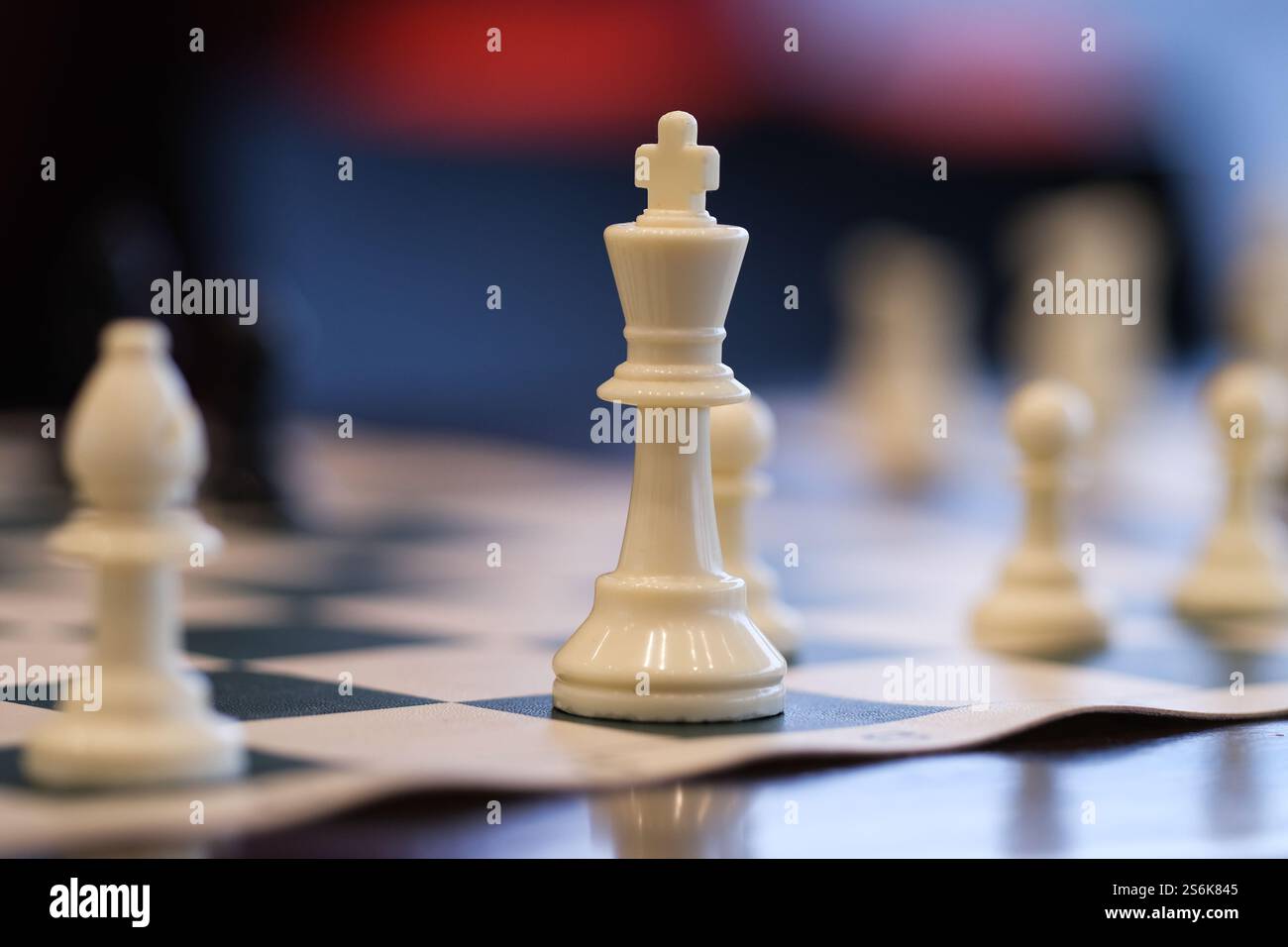 Different chess pieces with a king in focus Stock Photo - Alamy